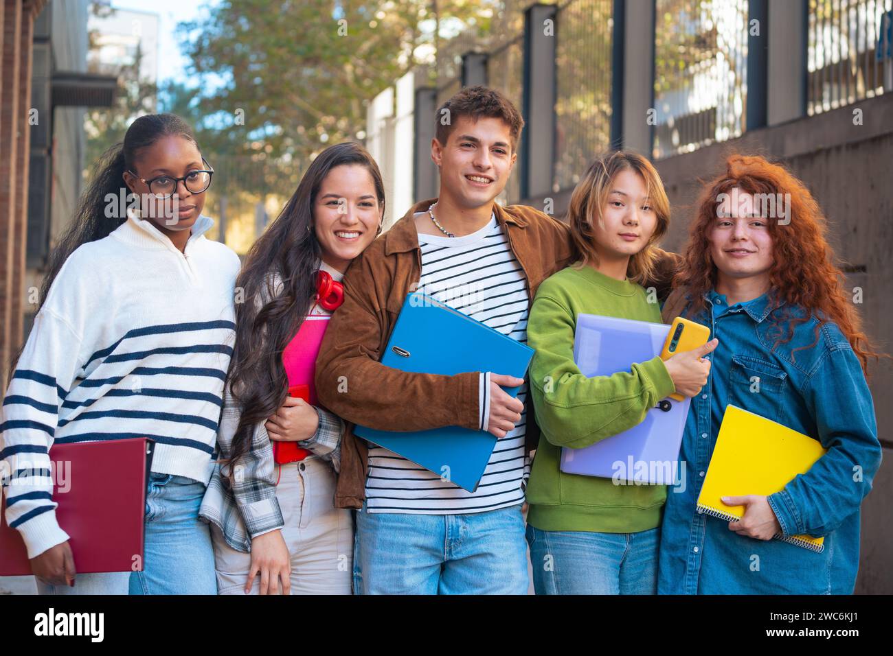 Group teens looking camera multi ethnic hi-res stock photography and ...