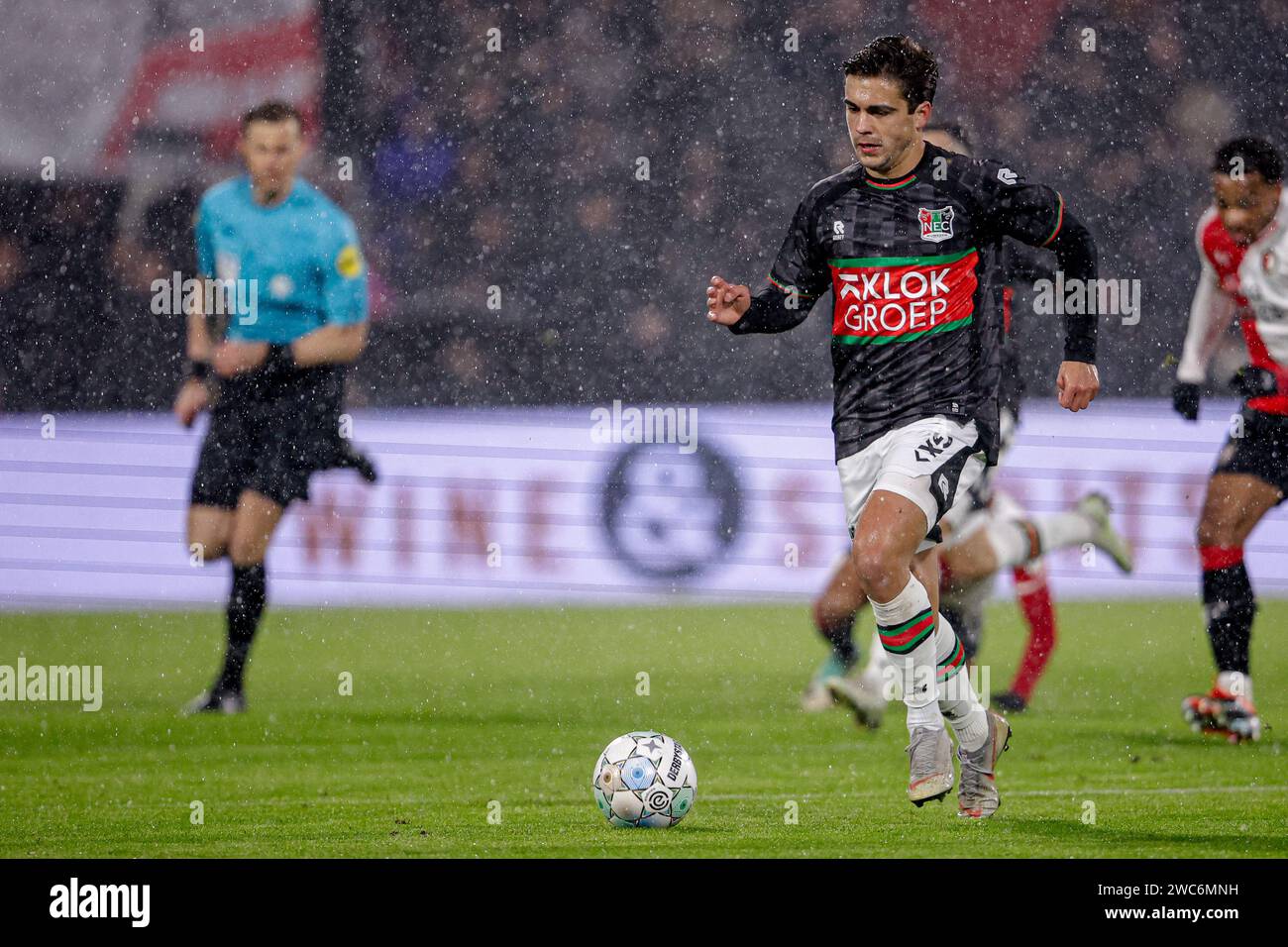 Rotterdam, Nederland. 14th Jan, 2024. ROTTERDAM, NEDERLAND - JANUARY 14: Bart van Rooij of NEC ...