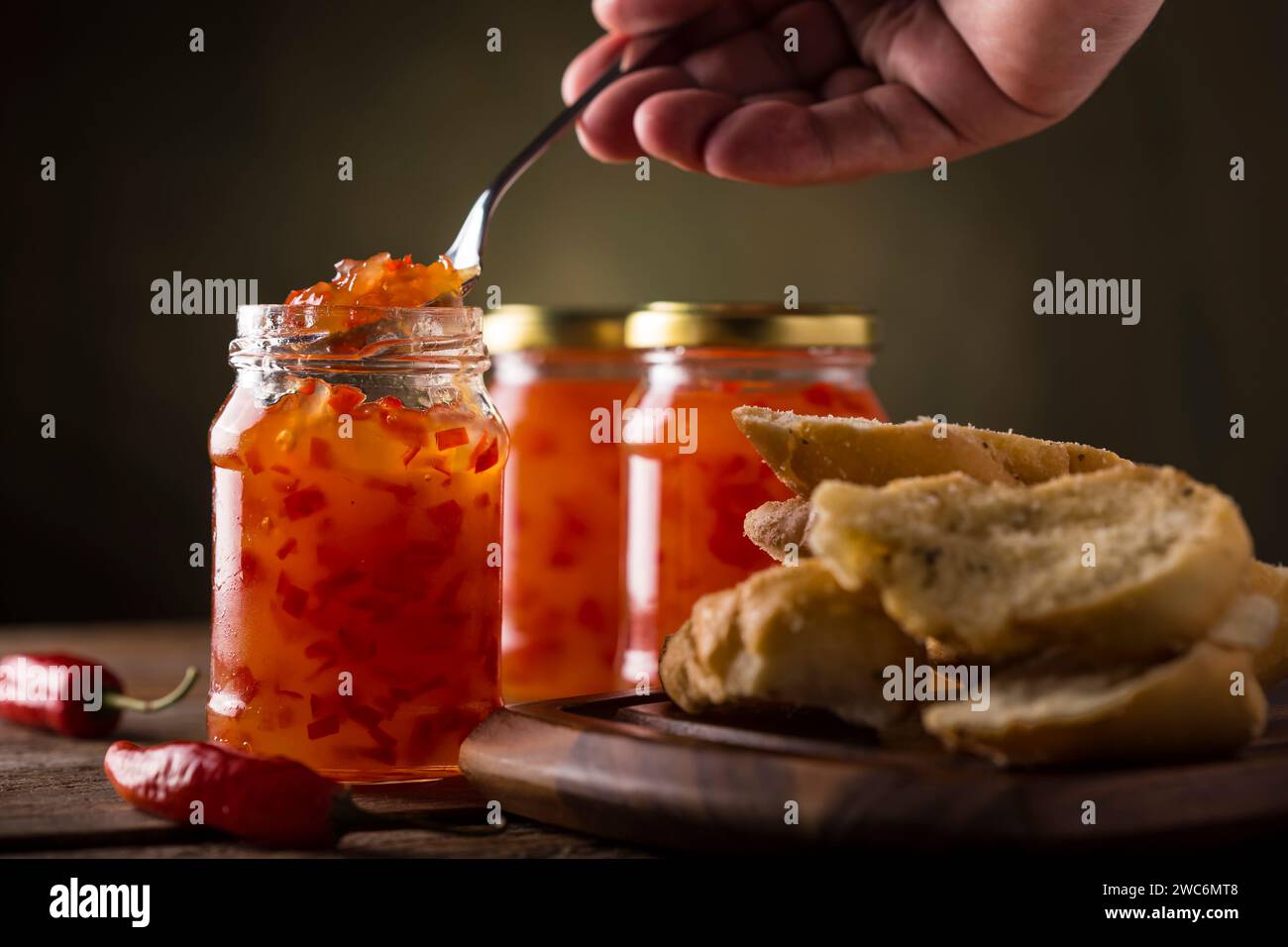 Pepper jam with toast on the table Stock Photo - Alamy