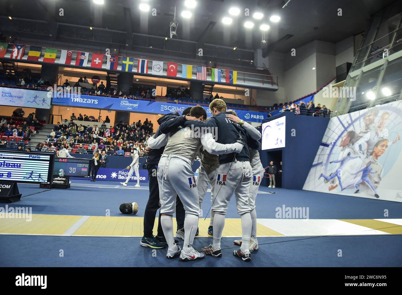 France's foilists team celebrates the winning during the finals of the ...