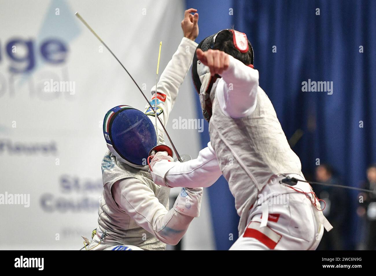 Italy's foilist ALESSIO FOCONI (L) competes against Poland's foilist ...