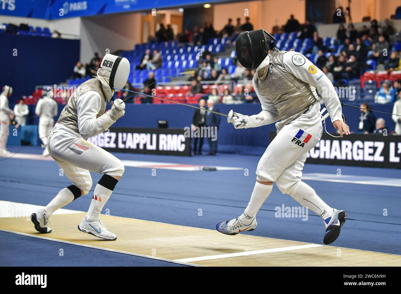 France's foilist MAXIME PAUTY (R) competes against Germany's foilist ...