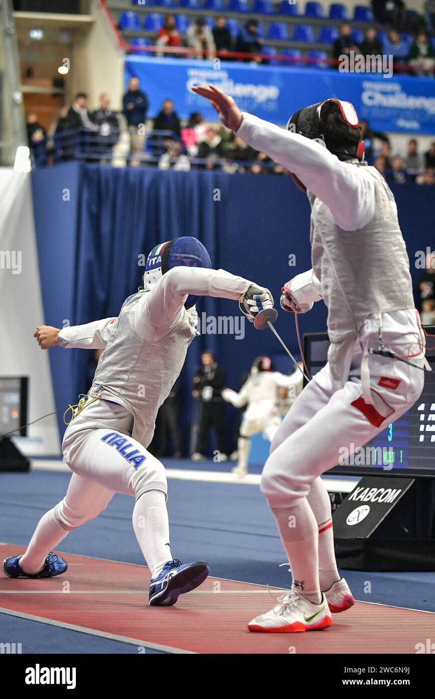 Italy's foilist ALESSIO FOCONI (L) competes against Poland's foilist ...