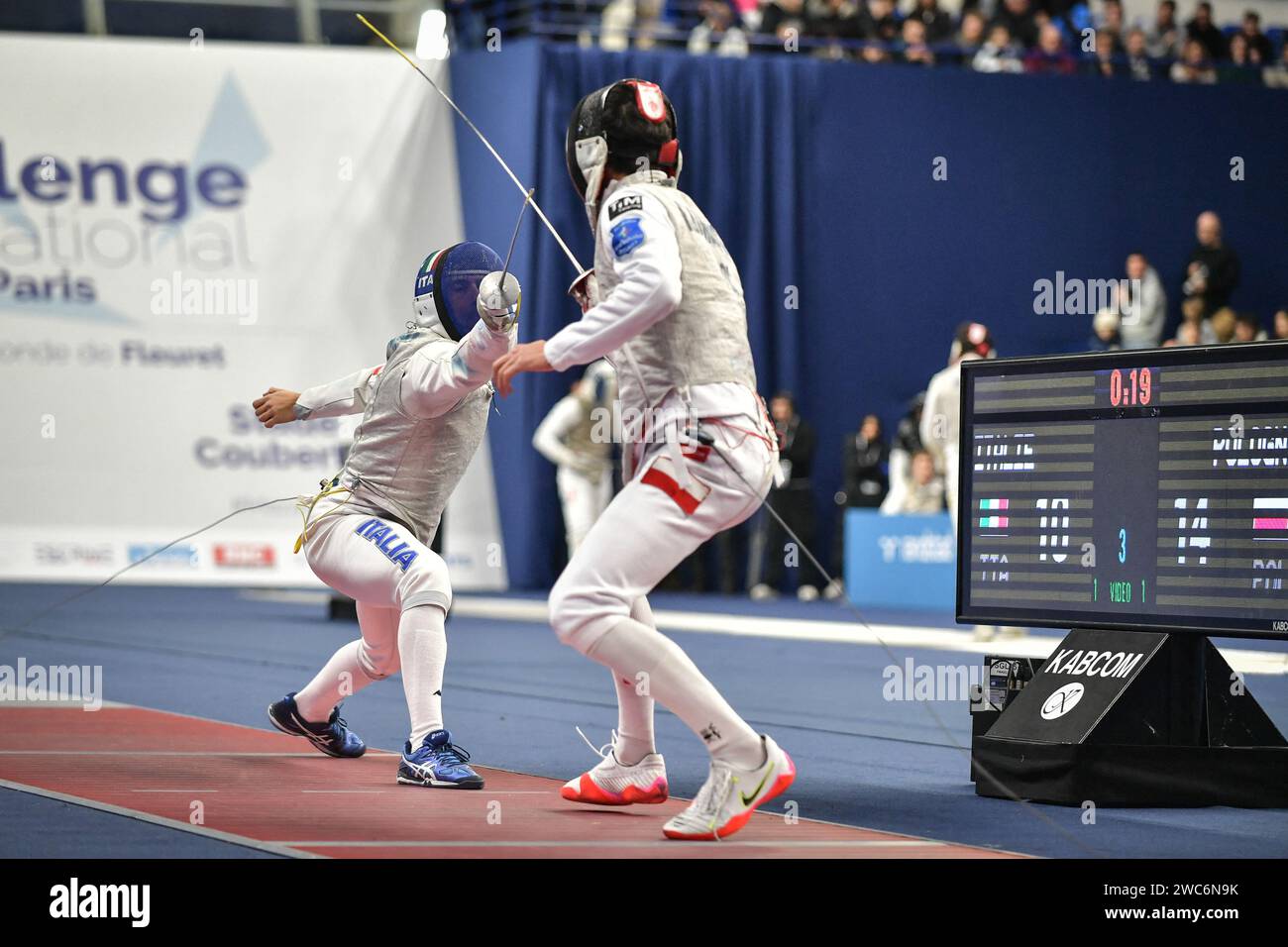 Italy's foilist ALESSIO FOCONI (L) competes against Poland's foilist ...