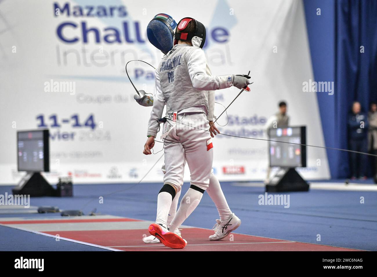 Italy's foilist DANIELE GAROZZO (L) competes against Poland's foilist ...