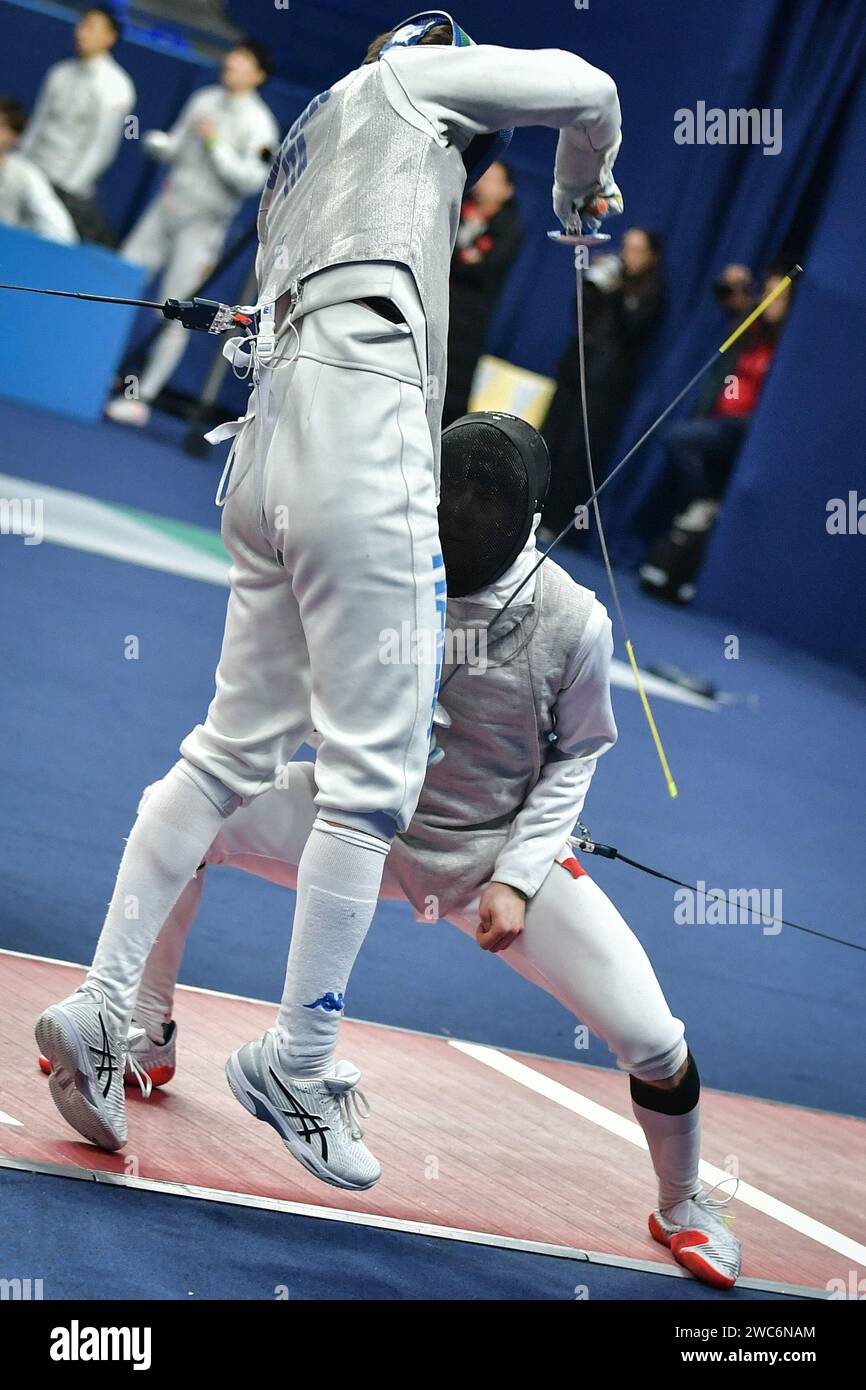 Italy's foilist DANIELE GAROZZO (L) competes against Poland's foilist ...
