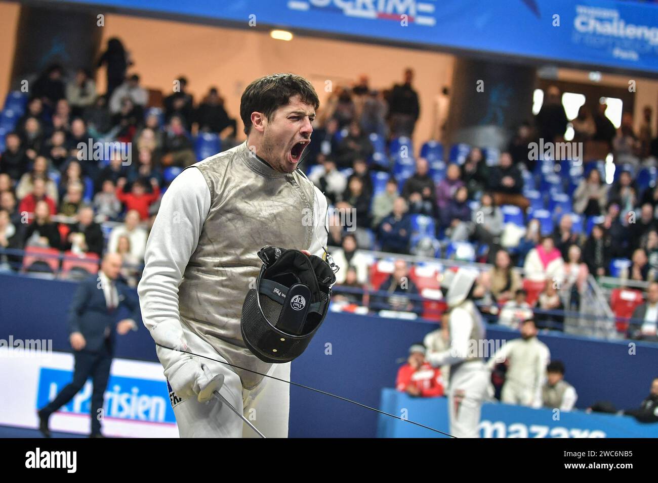 France's foilist MAXIME PAUTY celebrates winning during the quarter ...