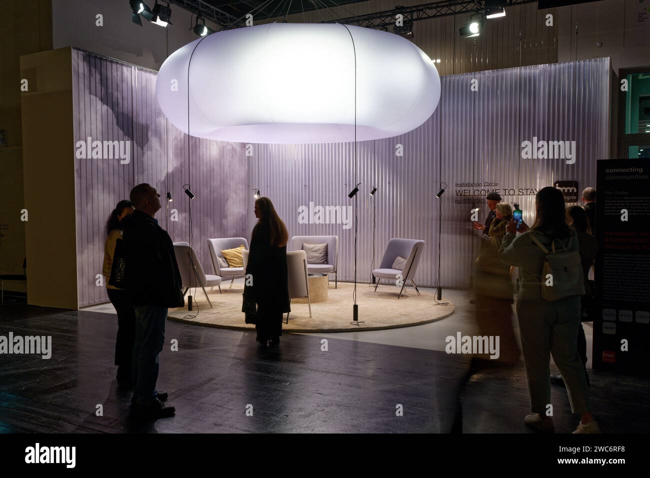 14 January 2024, North Rhine-Westphalia, Cologne: Visitors pass the ...