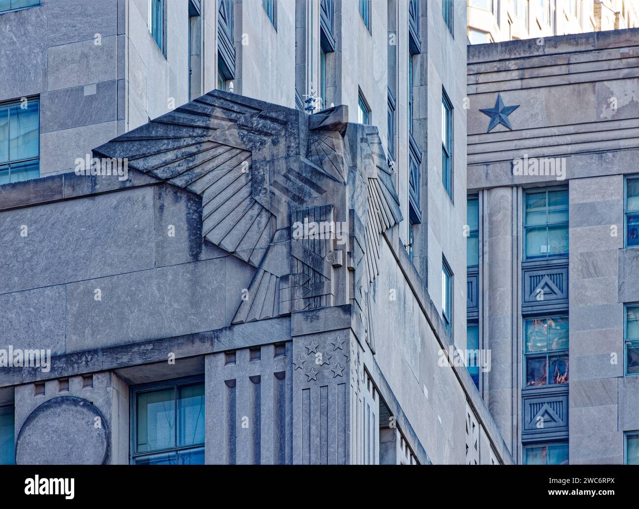 Massive Art Deco-styled limestone eagles decorate the corners of the ...