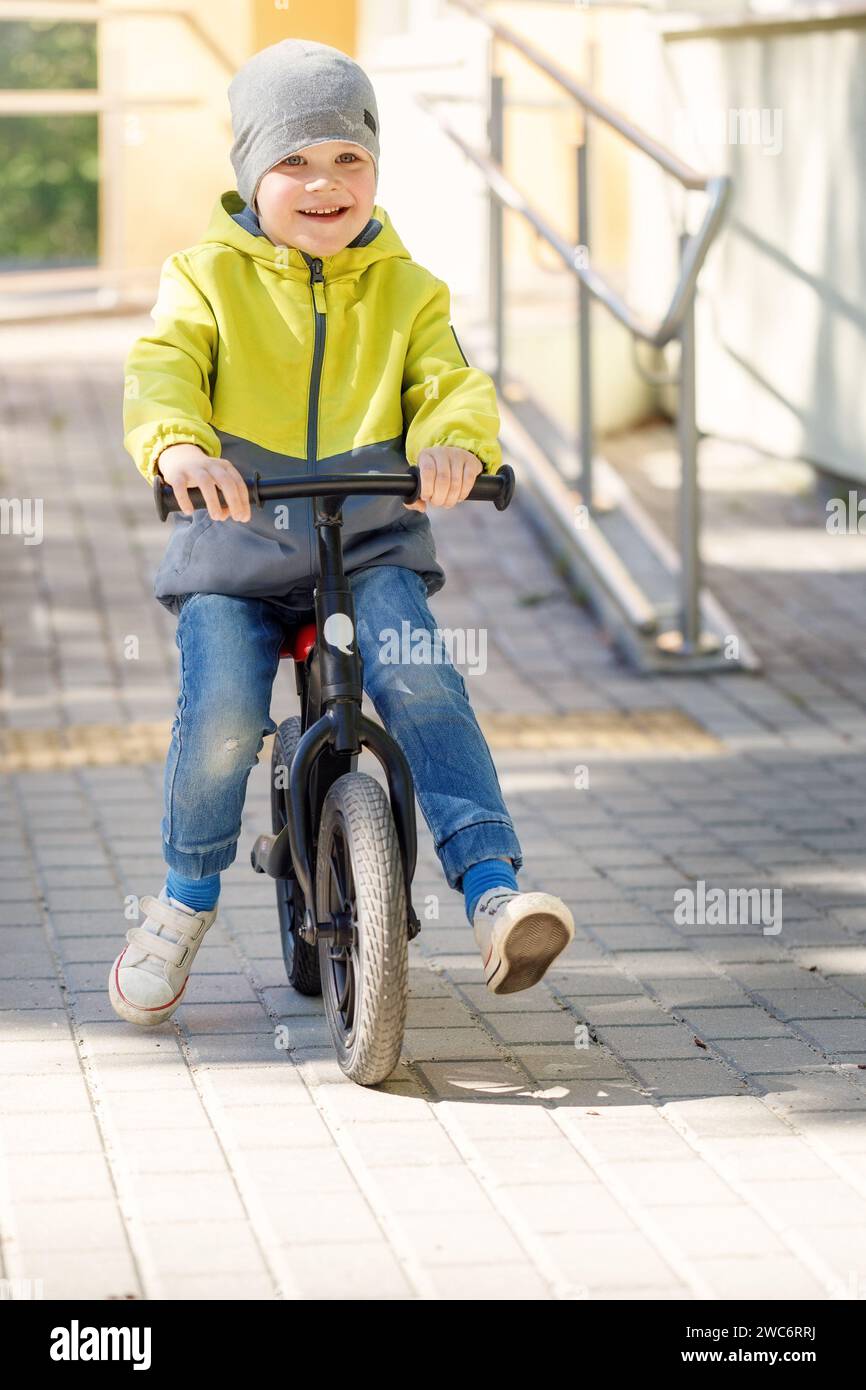 Boy riding his bicycle hi-res stock photography and images - Alamy