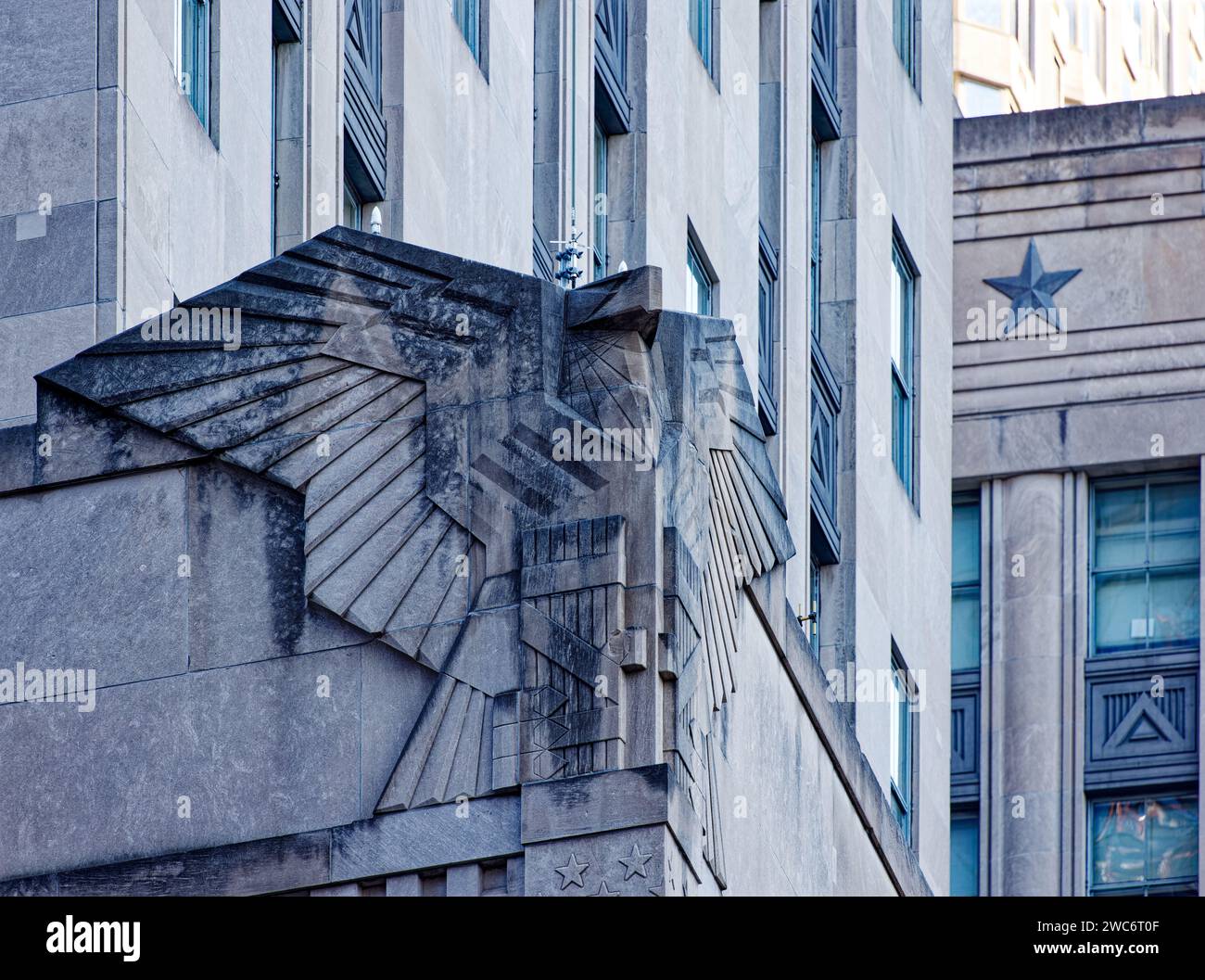 Massive Art Deco-styled limestone eagles decorate the corners of the ...