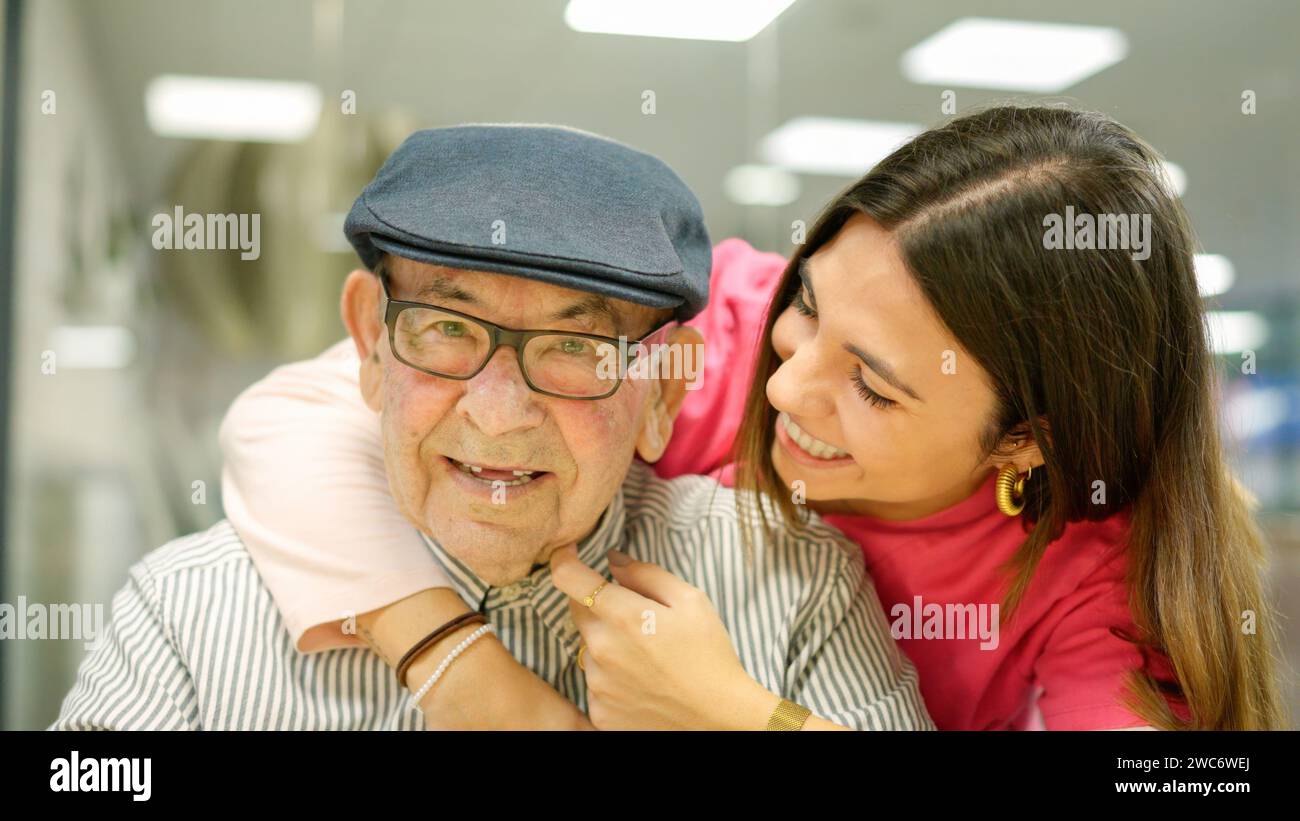 Kind nurse embracing a senior man in a nursing home Stock Photo - Alamy