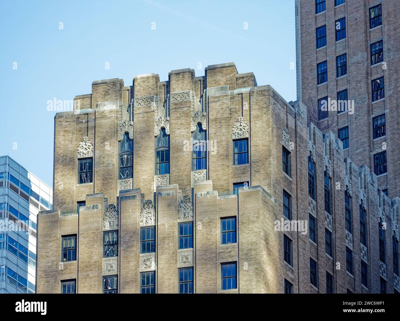 Barclay-Vesey Building’s polychrome brick façade is decorated in carved ...