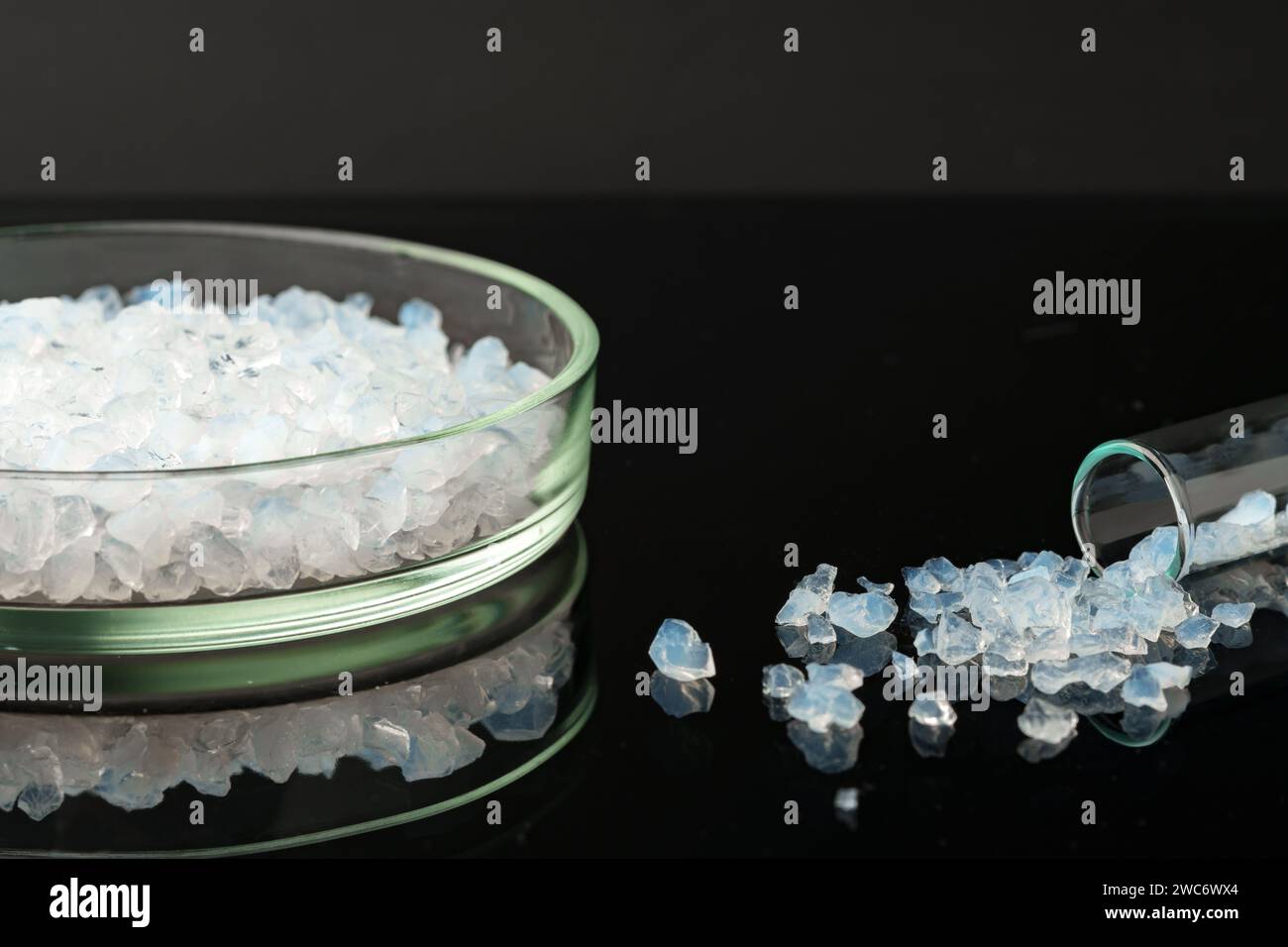 Pure silica gel crystals on black background Stock Photo - Alamy