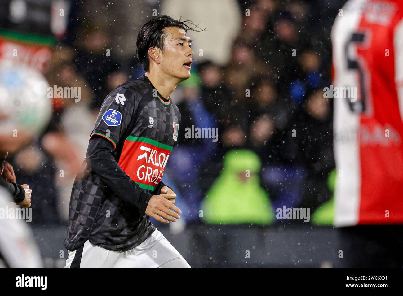 Rotterdam, Nederland. 14th Jan, 2024. ROTTERDAM, NEDERLAND - JANUARY 14: Koki Ogawa of NEC looks ...