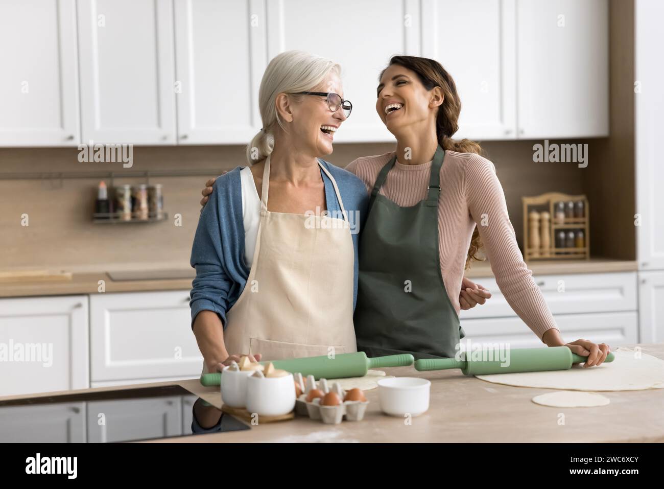 Old woman wearing aprons hi-res stock photography and images - Alamy