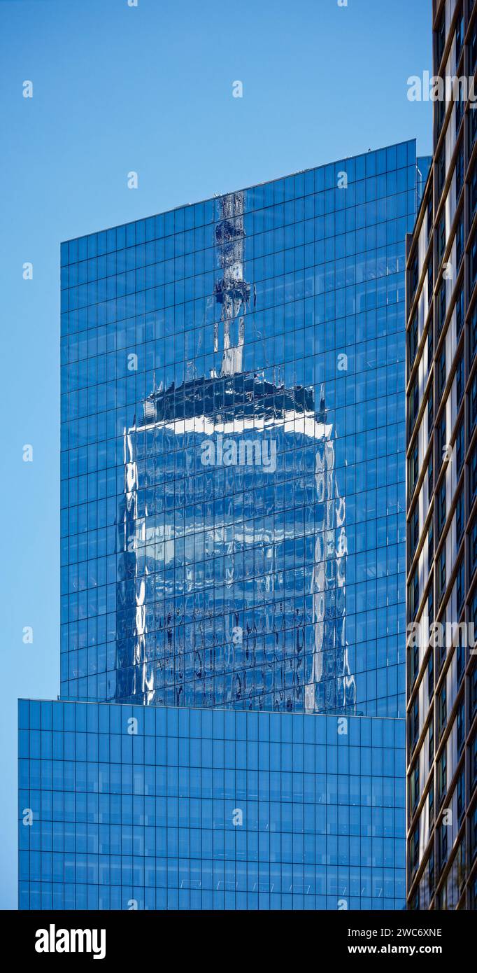 The highly reflective curtain wall of Four World Trade Center mirrors ...