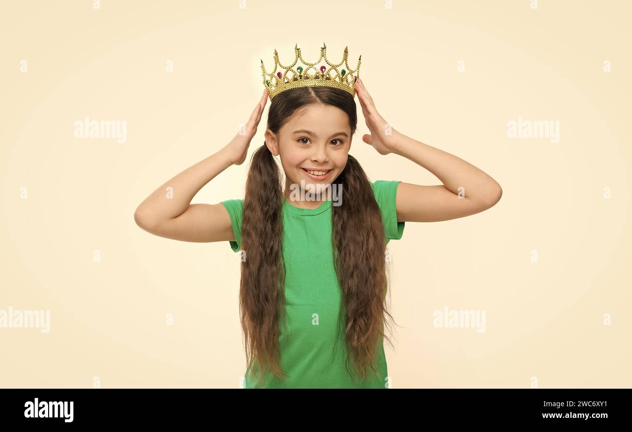 Kid wear golden crown symbol of princess. Girl dreaming become princess ...