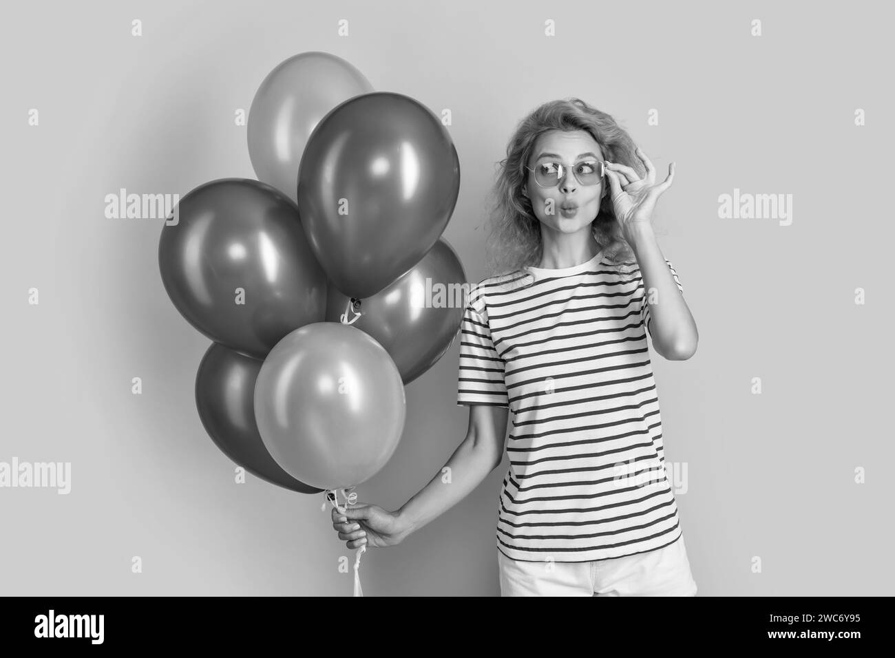 positive woman with birthday balloon in sunglasses. happy birthday ...