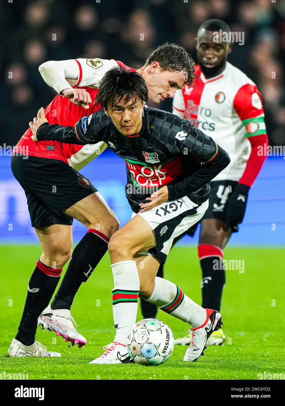Rotterdam, The Netherlands. 14th Jan, 2024. Rotterdam - Mats Wieffer of Feyenoord, Koki Ogawa of ...