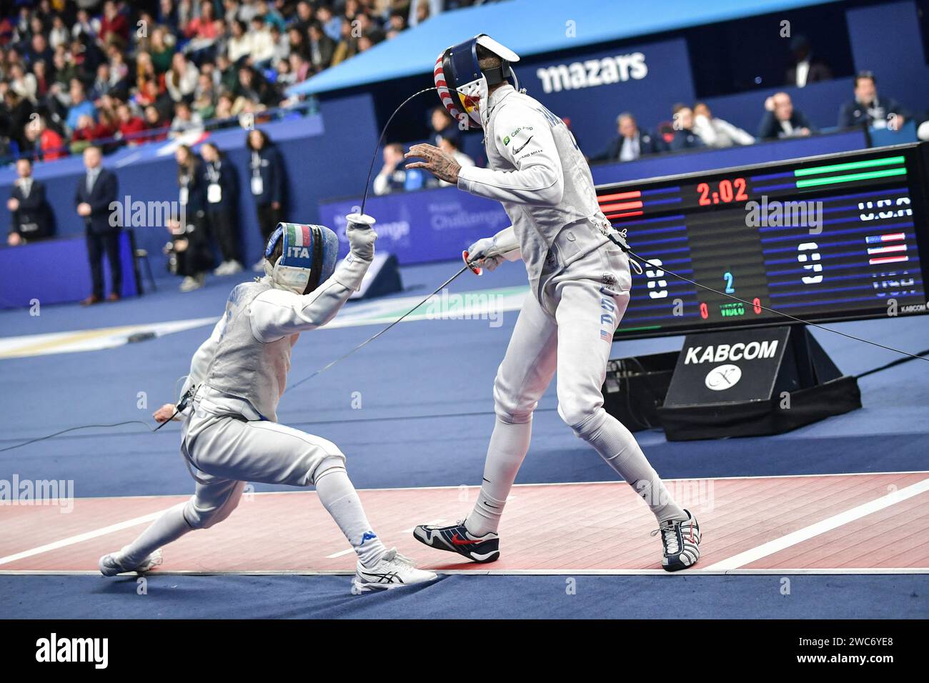 Paris, France. 14th Jan, 2024. USA foilist MILES CHAMLEY-WATSON (R ...