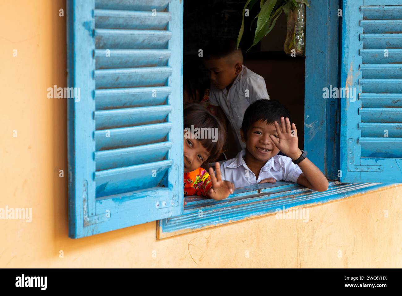 Students by the window at school in Cambodia Stock Photo - Alamy