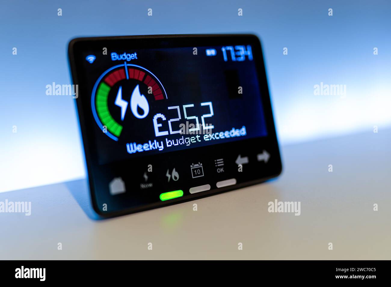 Smart Meter with Budget Exceeded Warning Stock Photo - Alamy