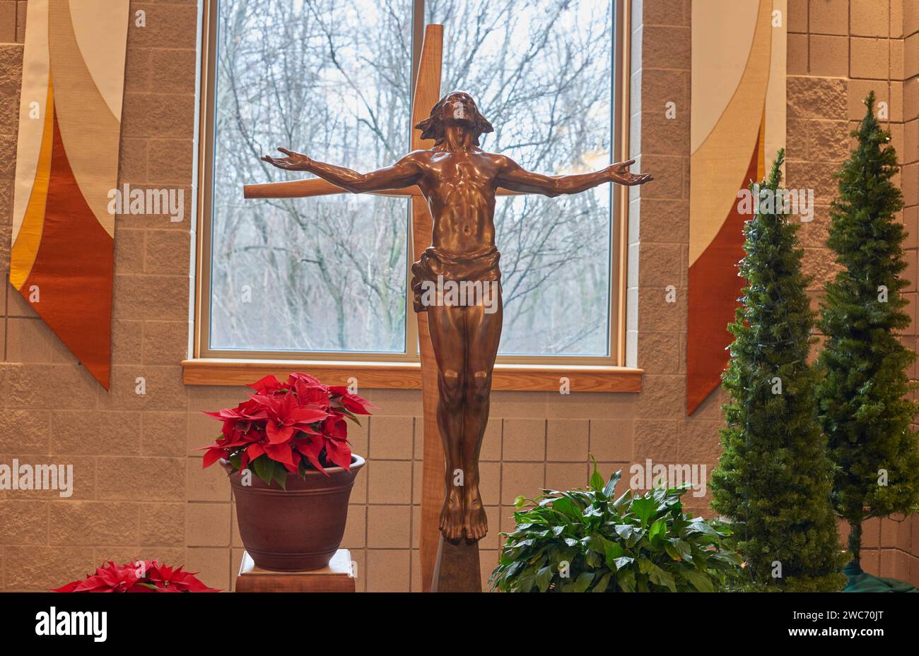 Catholic Church. Statue of Jesus Chris impaled on cross in sanctuary ...
