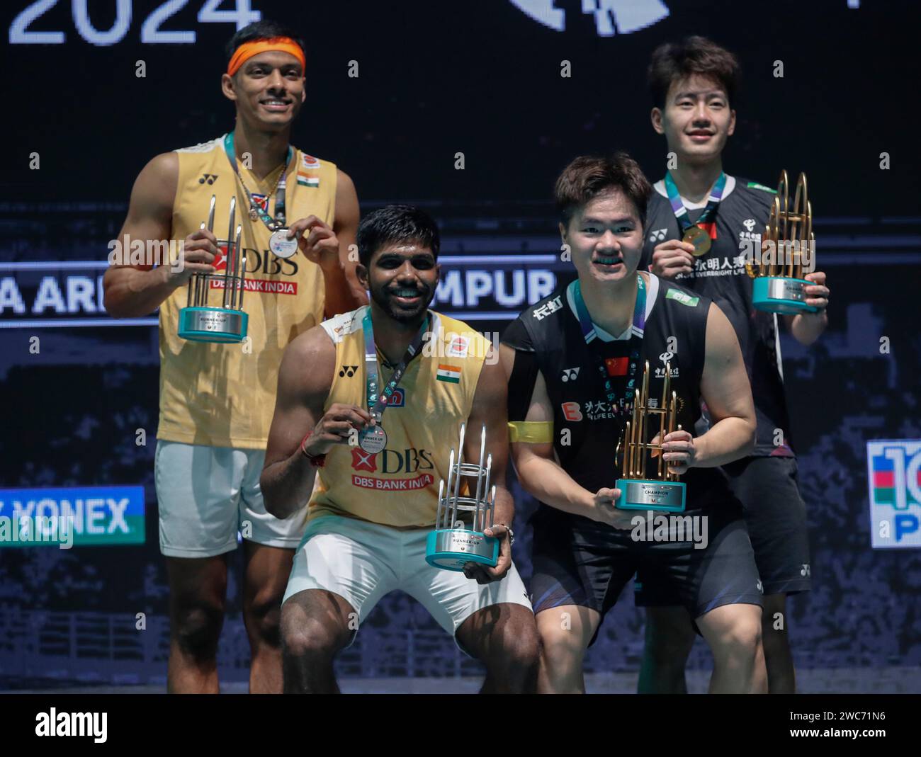 Kuala Lumpur, Malaysia. 14th Jan, 2024. Liang Wei Keng (R2) and Wang Chang (R1) of China and ...