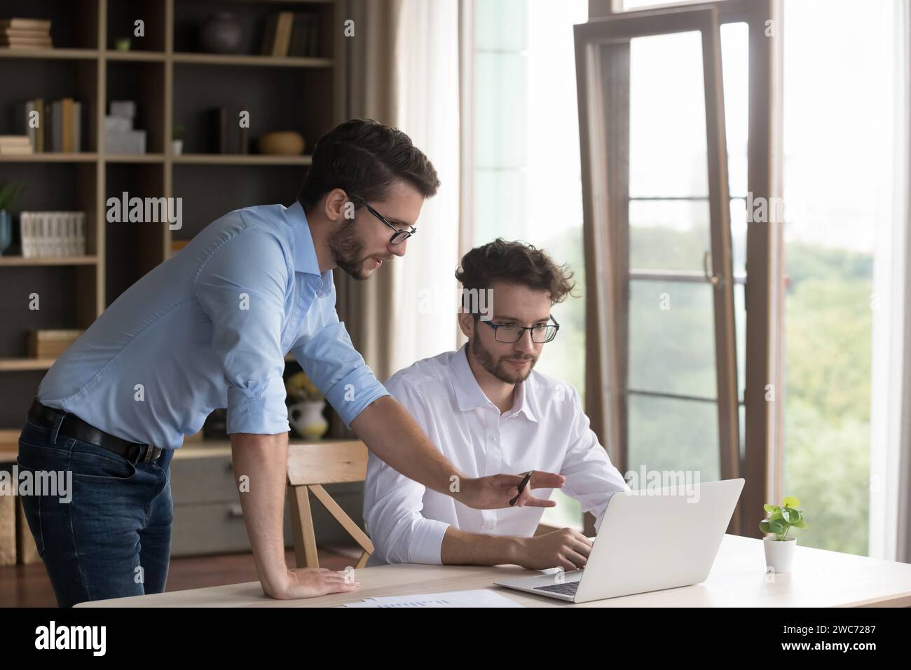 Two brothers work together in hi-res stock photography and images - Alamy