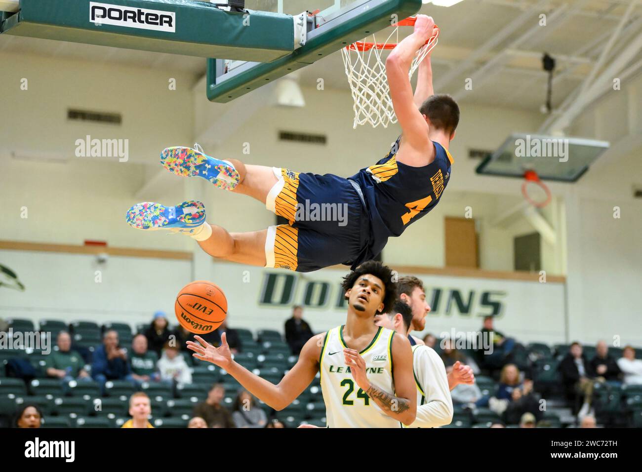 January 13, 2024: Merrimack Warriors guard Jordan Derkack (4) hangs on ...