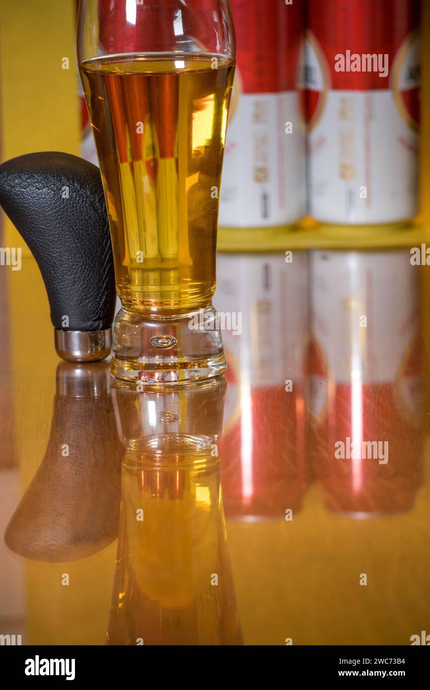 the choice between alcohol and driving, beer by the glass and cans and ...