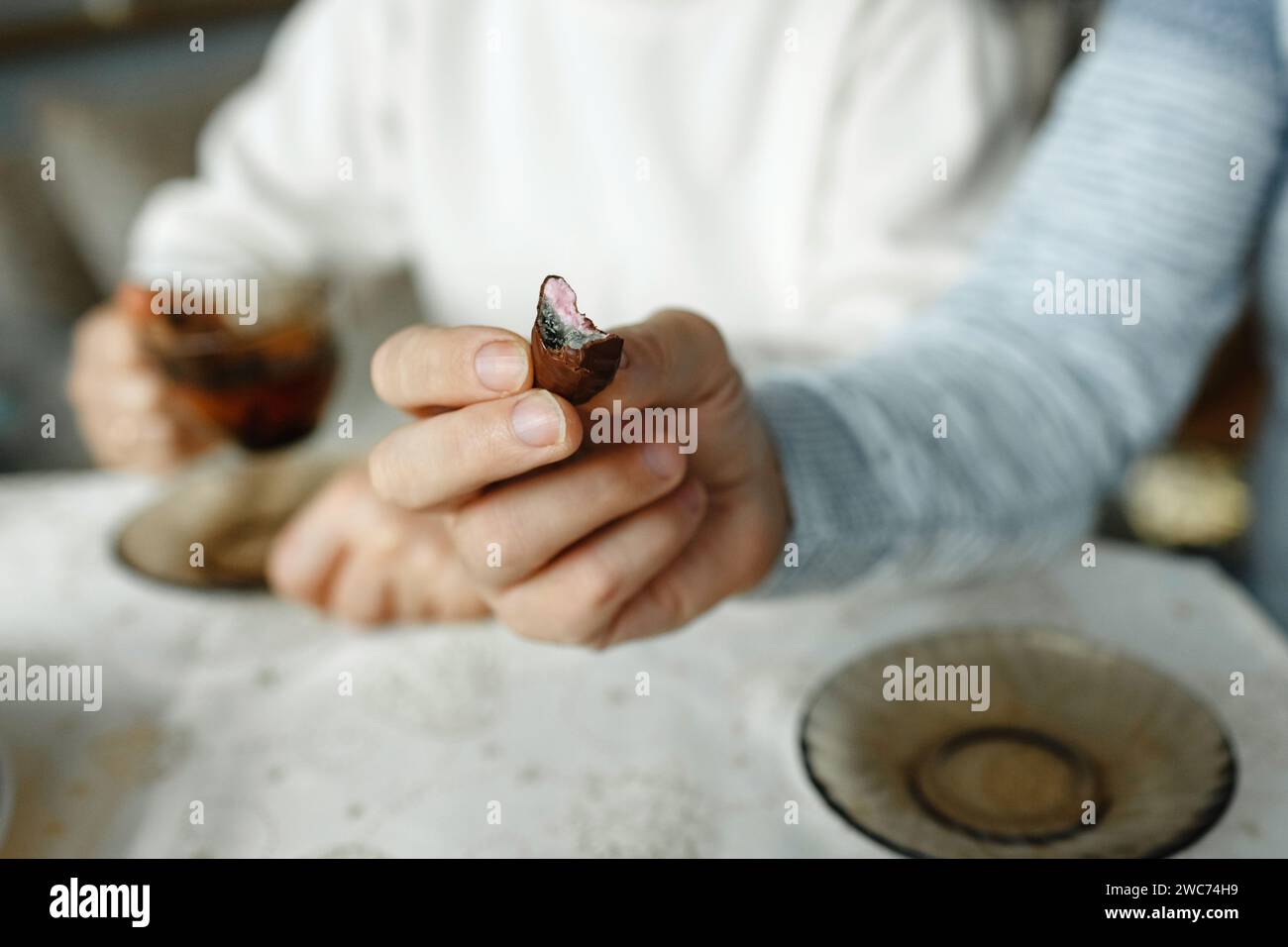 Man eats chocolate candy hi-res stock photography and images - Alamy