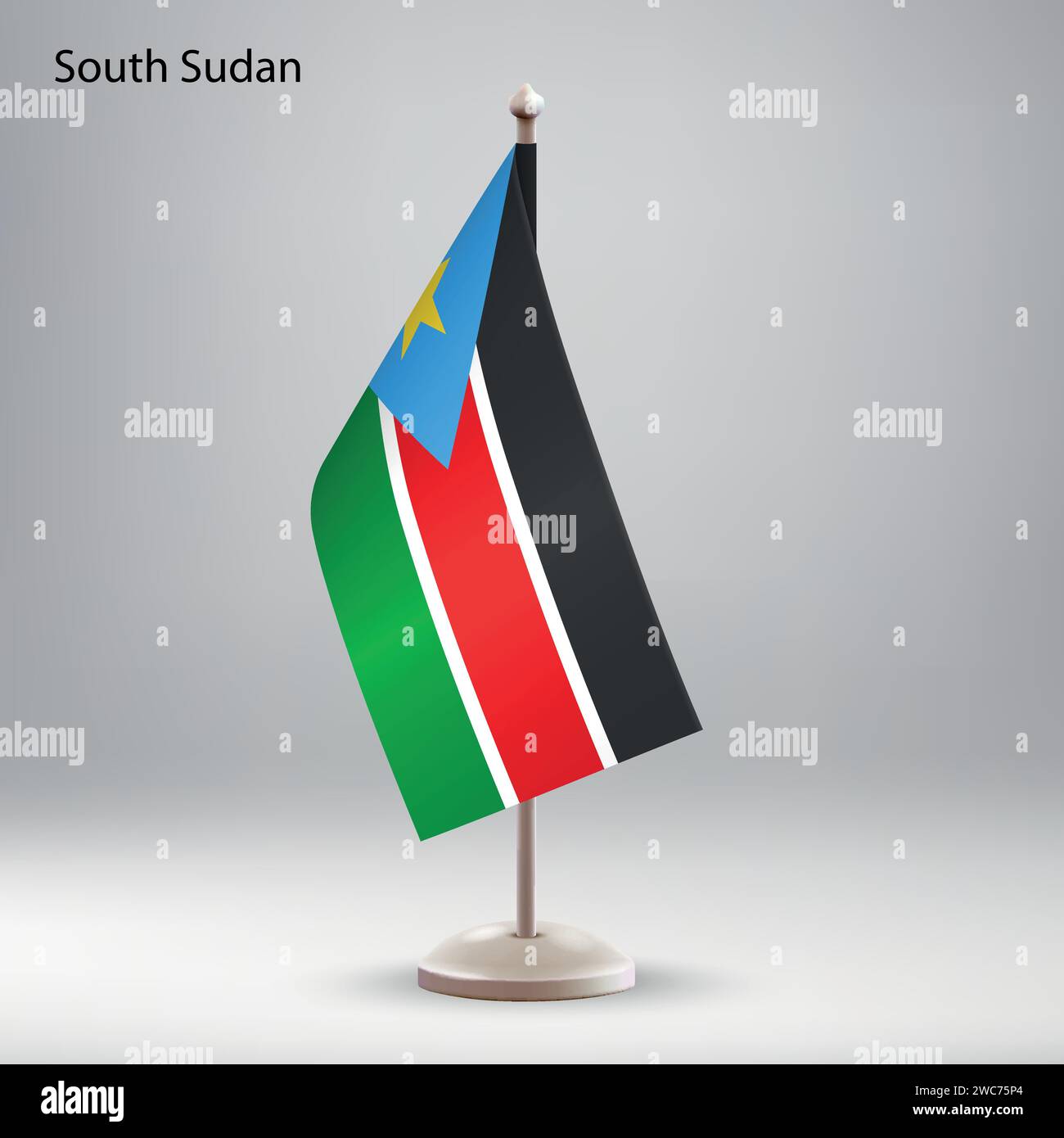Flag of South Sudan hanging on a flag stand. Usable for summit or ...