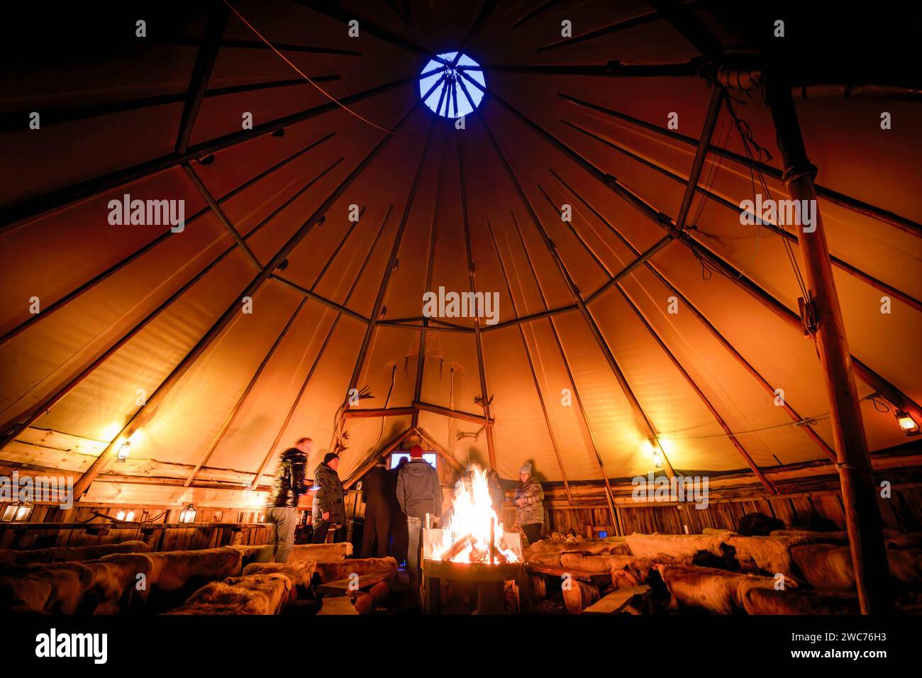 Interior view of "lavvu" or conical tent on a Sami reindeer farm. In ...