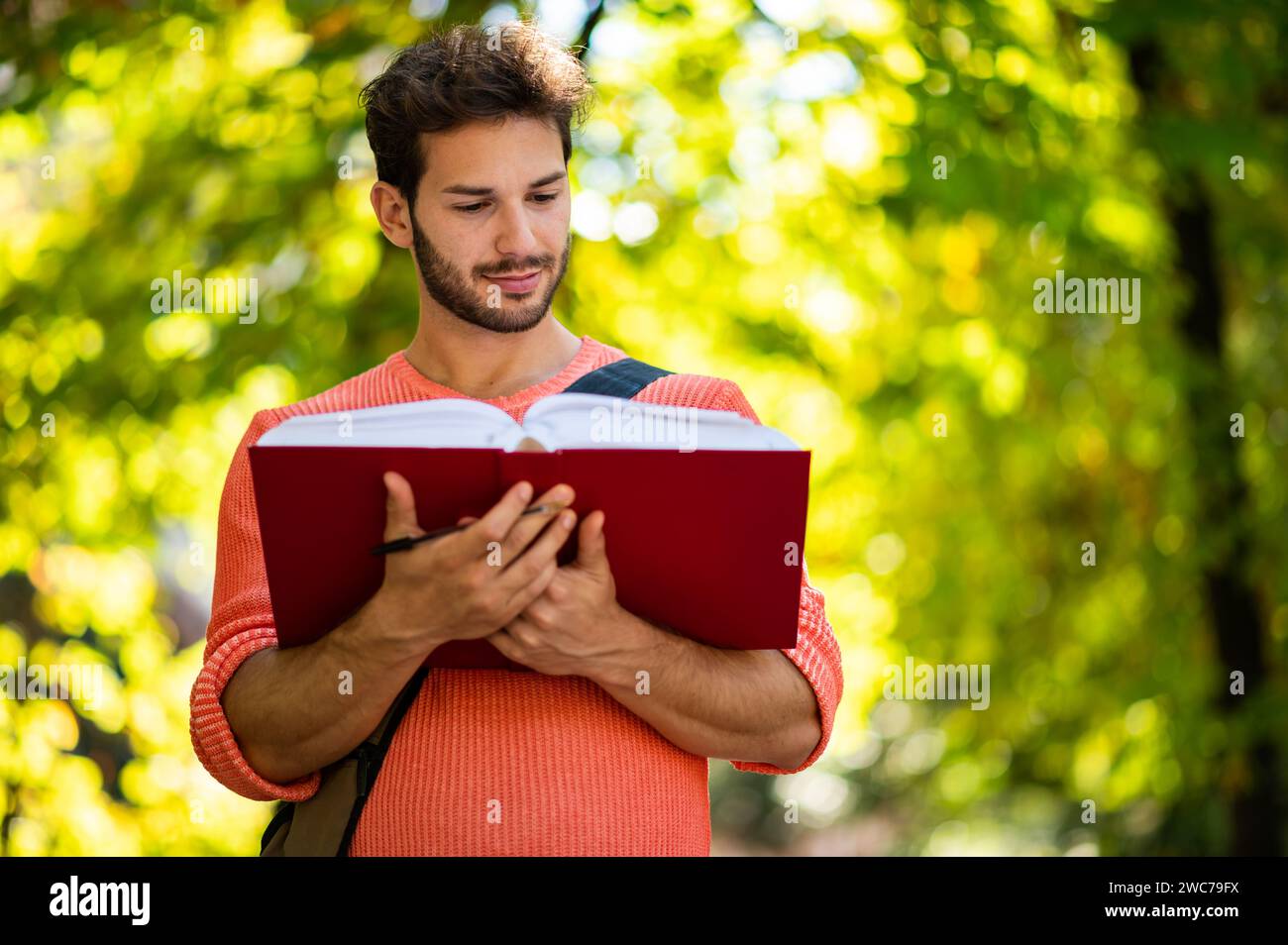 Male teen class reading hi-res stock photography and images - Alamy