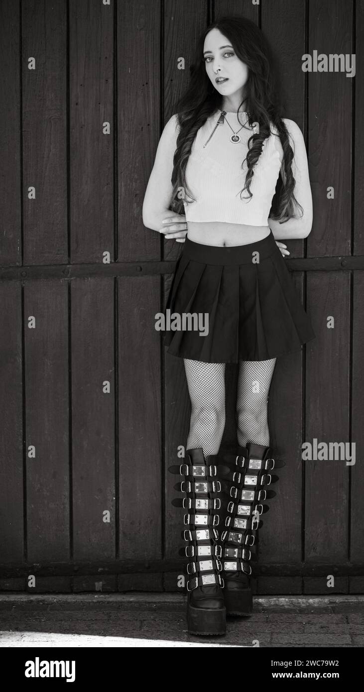 A grayscale shot of a goth girl in an urban setting Stock Photo - Alamy