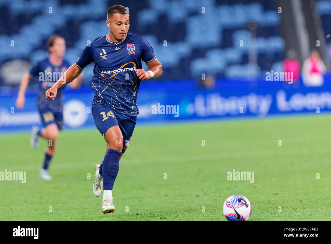 Sydney, Australia. 14th Jan, 2024. Dane Ingham of Newcastle Jets chases ...