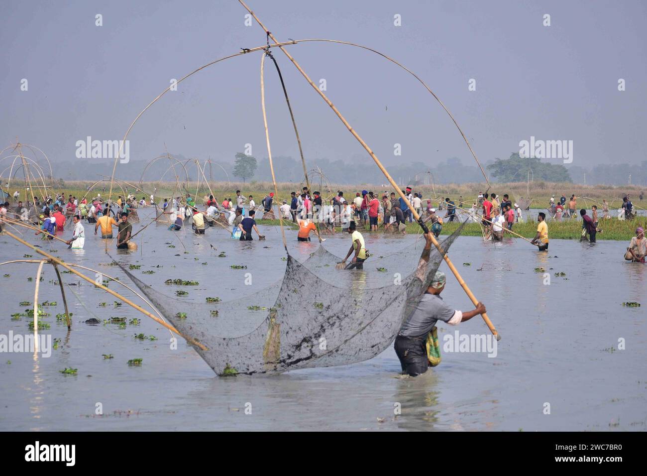 Guwahati, India. 14th Jan, 2024. Villagers are participating in a ...