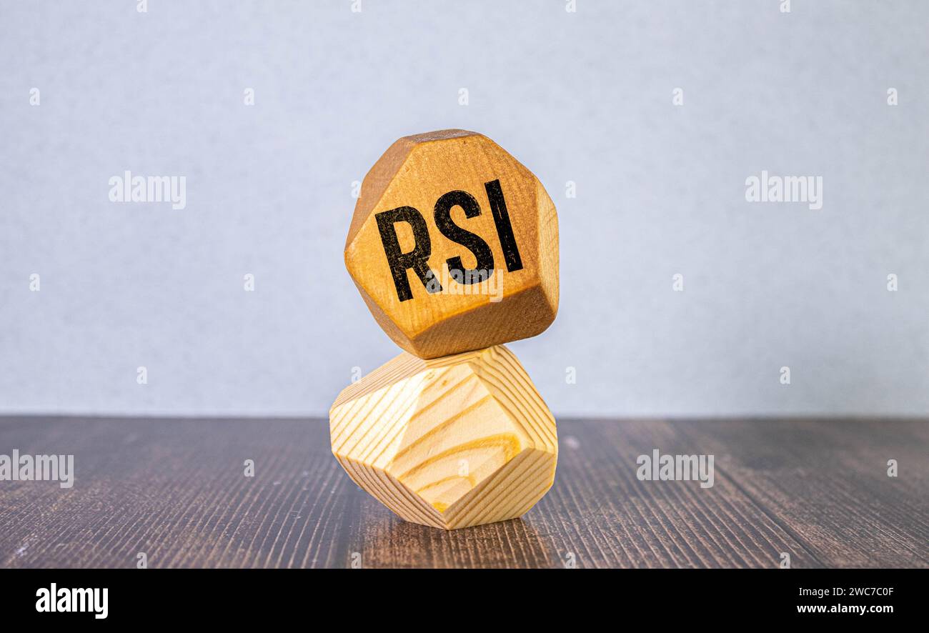 On a bright blue background, light wooden blocks and cubes with the ...
