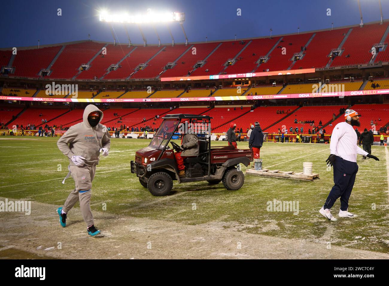 The Kansas City Chiefs grounds crew were dragging the icy turf as Miami ...