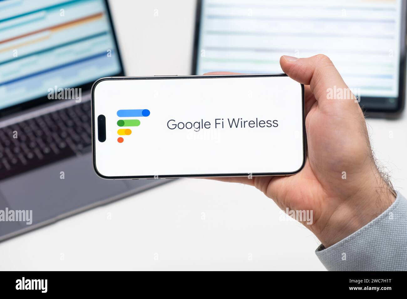 Google Fi Wireless logo of app on the screen of mobile phone held by ...