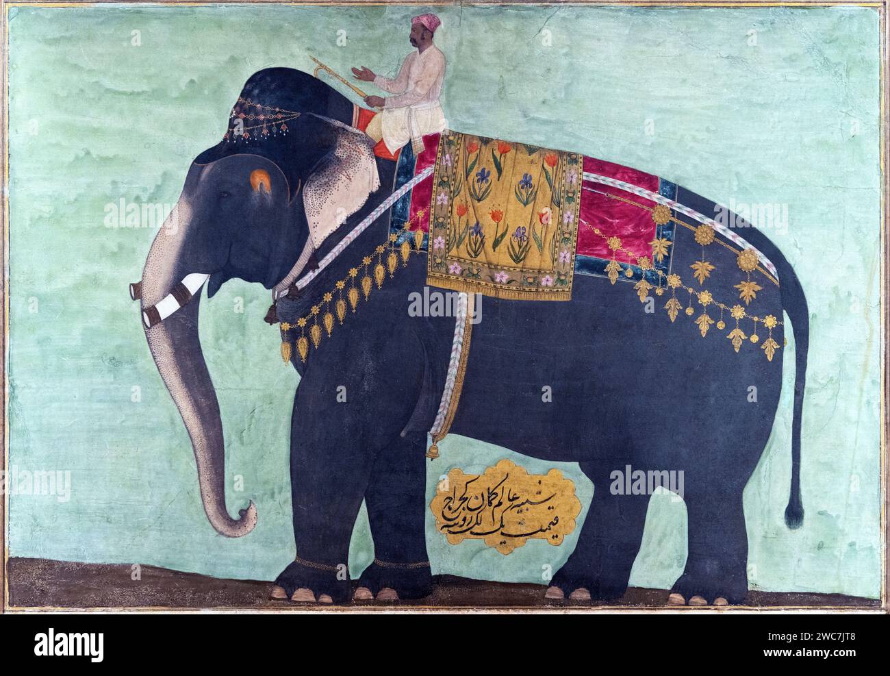 Ancient elephant and rider painted on paper. Painting exposed at ...