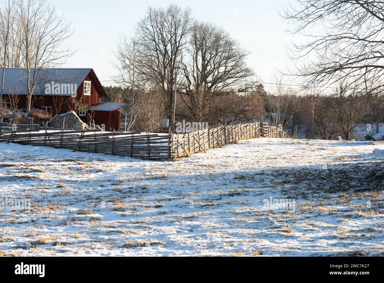 Winter Scenery In A Swedish Village With Fences And Red Wooden ...
