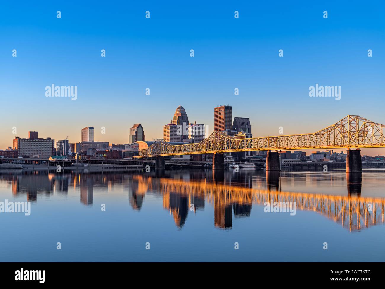 A magnificent bridge spanning over a bustling river, with a captivating ...