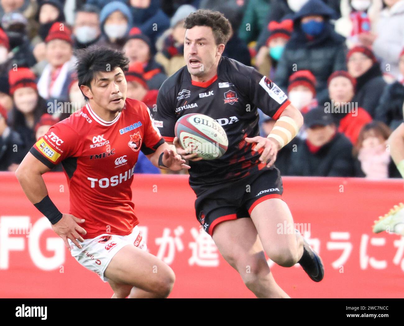 Tokyo, Japan. 14th Jan, 2024. Mie Honda Heat full back Tom Banks ...
