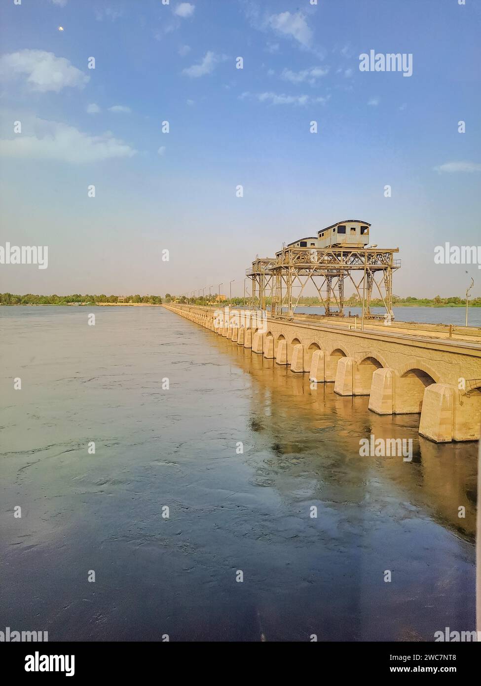 Cruises passing through the Esna Lock, a structure of gateway on the ...