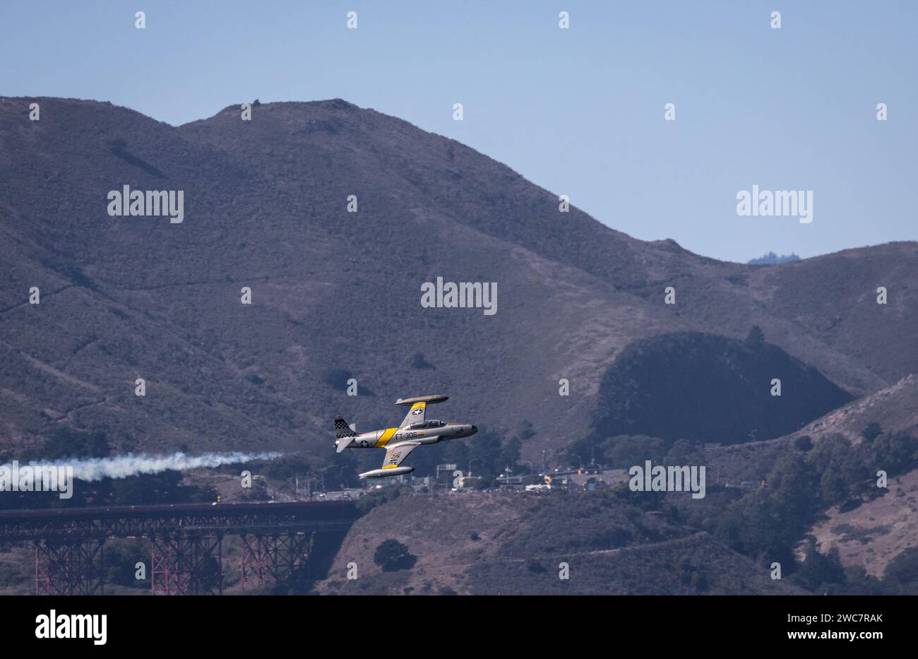A T-33 vintage jet flying in San Francisco during an airshow by the ...