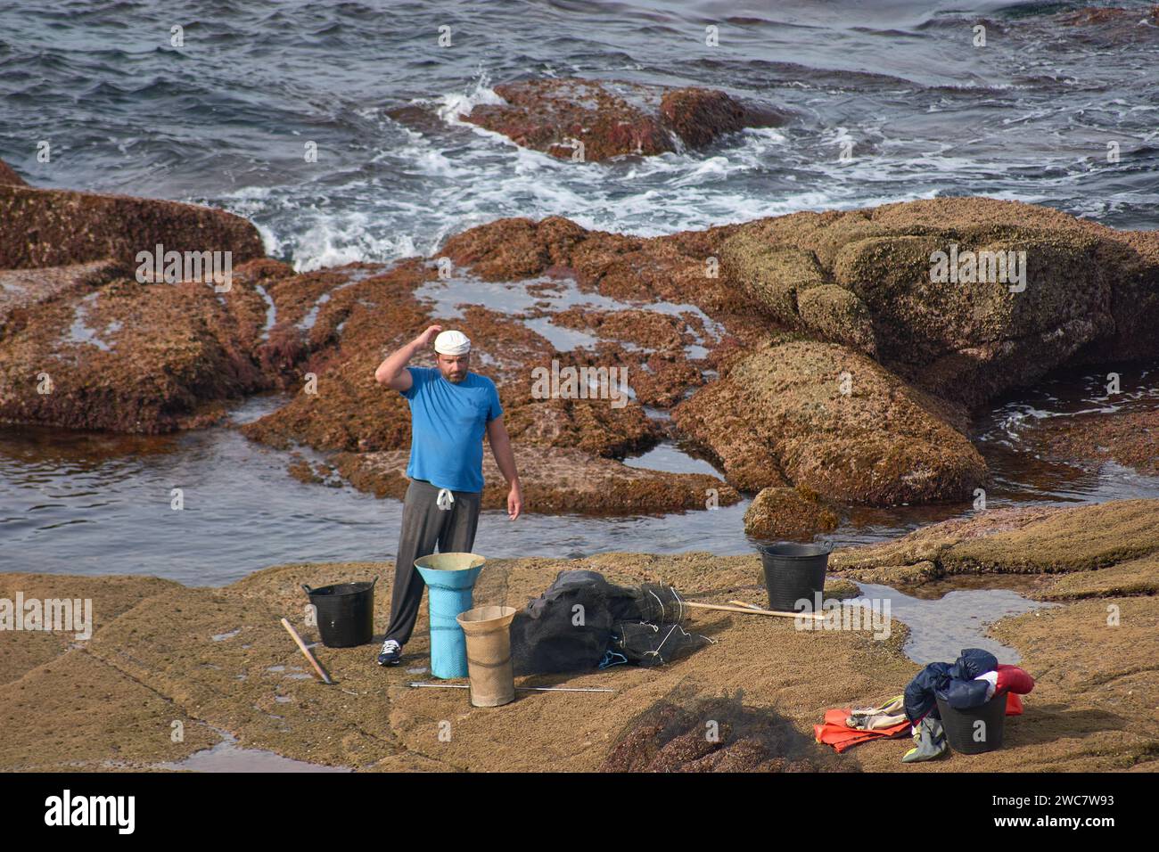 The barnacles use a scraper to collect the barnacles that are stuck to ...