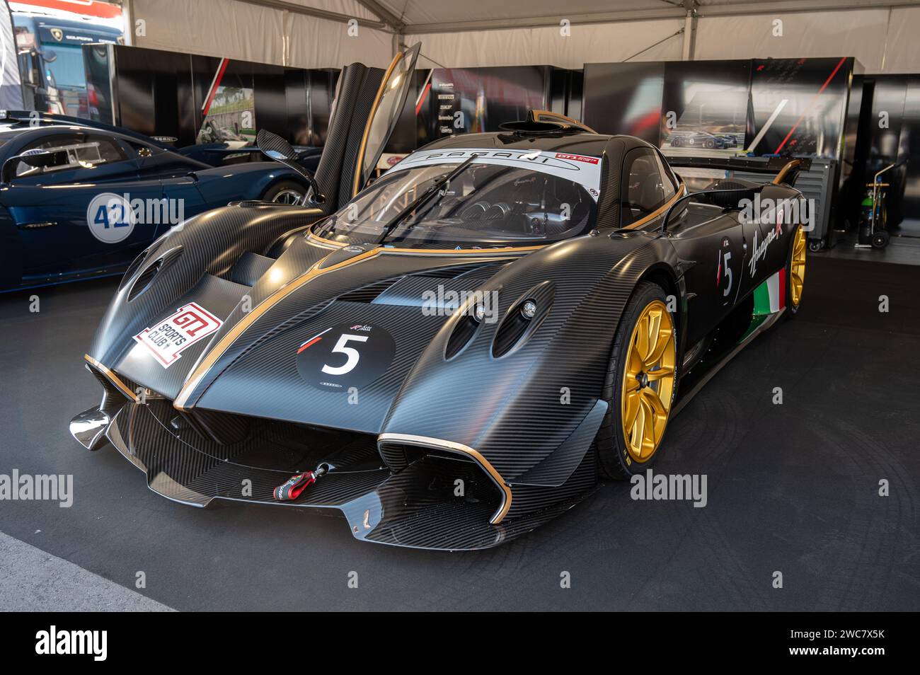Front view of a stunning textured carbon fiber colored Pagani Huayra R ...